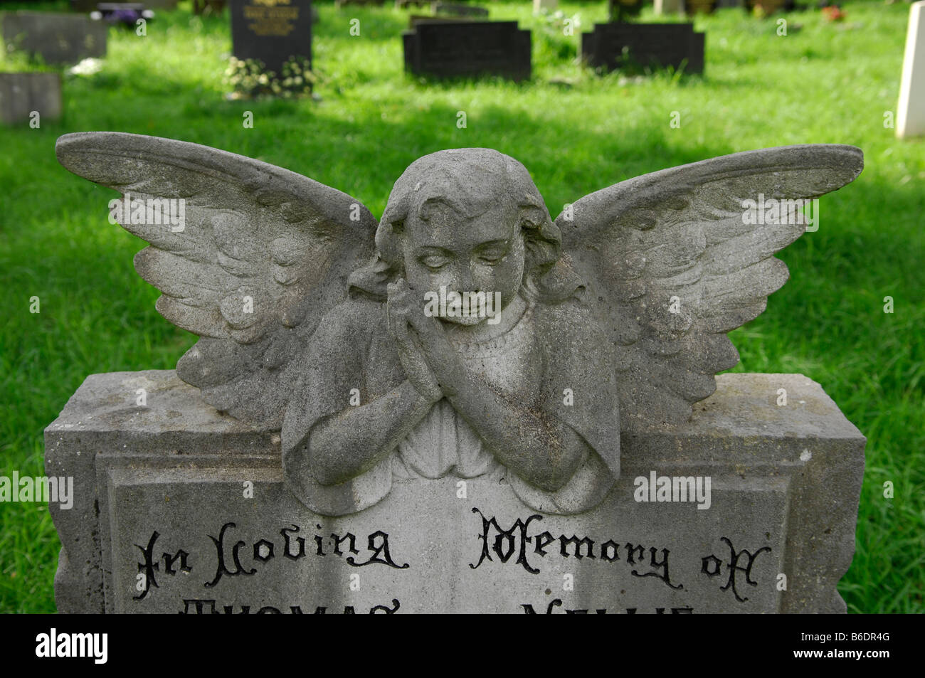 graveyard stone angel grave cemetery in sacred memory of burial death ...