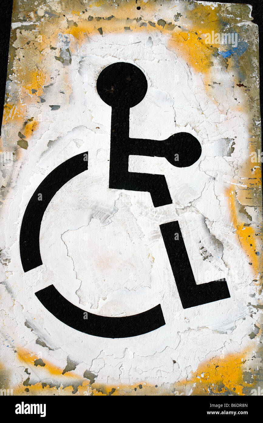 Urban Scene of a Stencil for Spray Painting a Handicapped Parking Sign ...