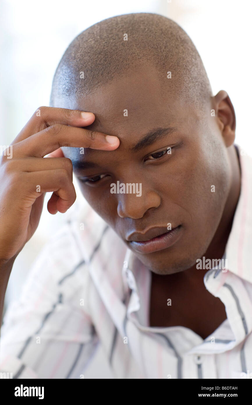 Fingers on forehead hi-res stock photography and images - Alamy