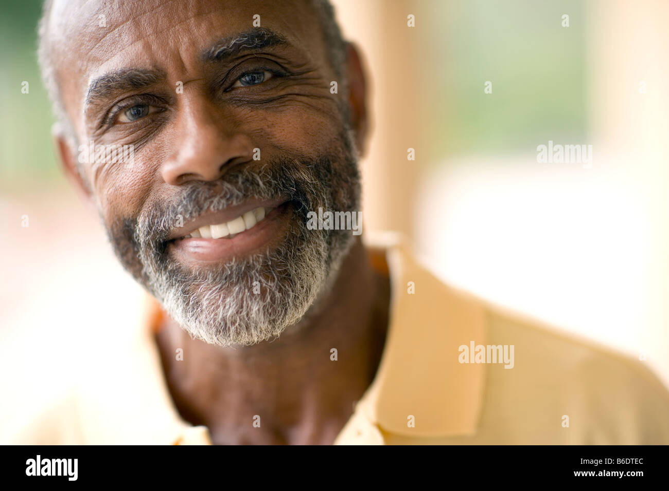 Elderly man smiling Stock Photo - Alamy