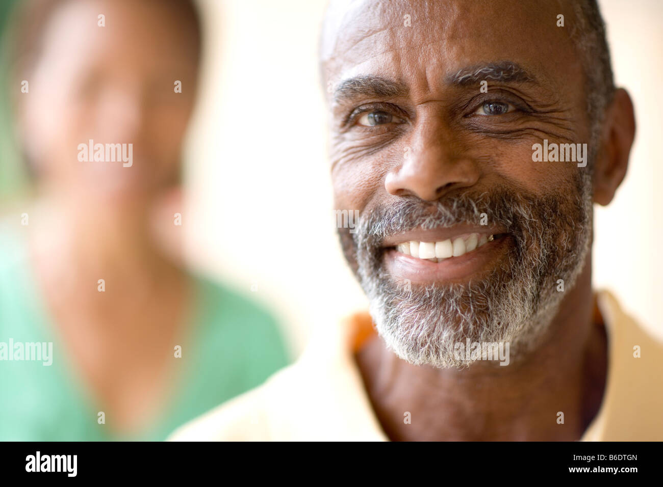 Relationship. Elderly man with his partner in the background Stock ...