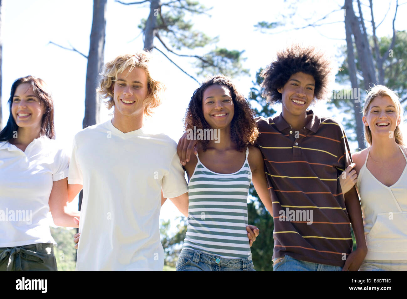 Friendship. Group of friends socialising Stock Photo - Alamy
