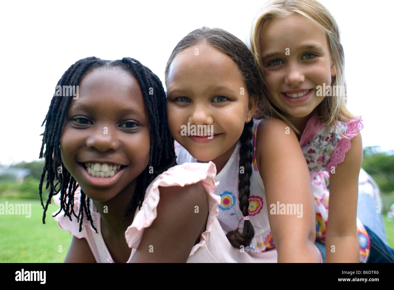 Girls huddled together hi-res stock photography and images - Alamy