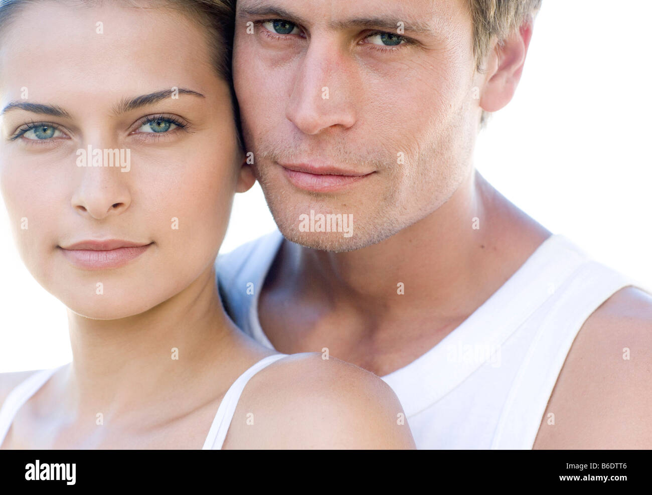 Couple. Man standing behind his partner Stock Photo - Alamy