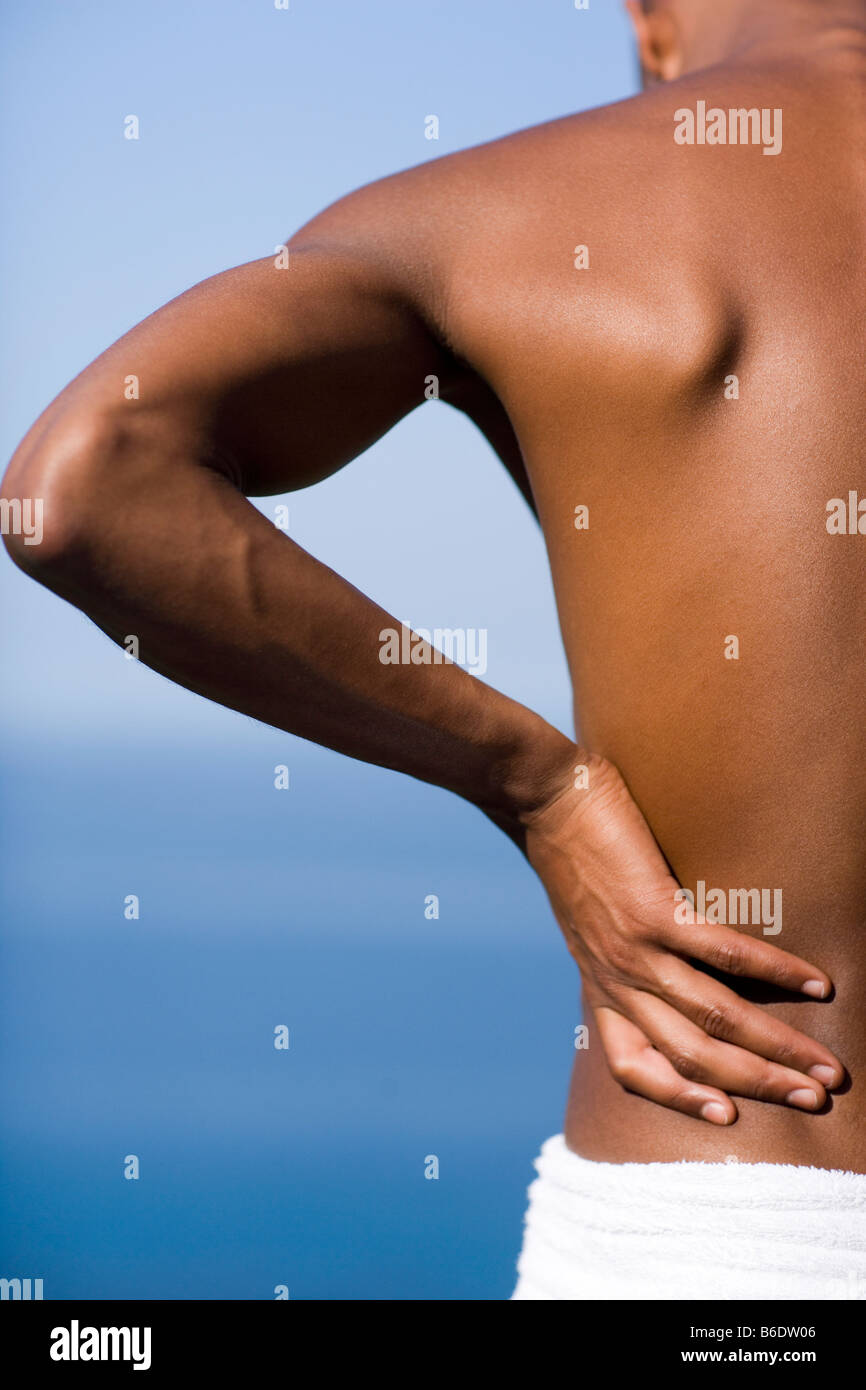 Man holding his painful lower back, the lower backpain could be lumbago ...