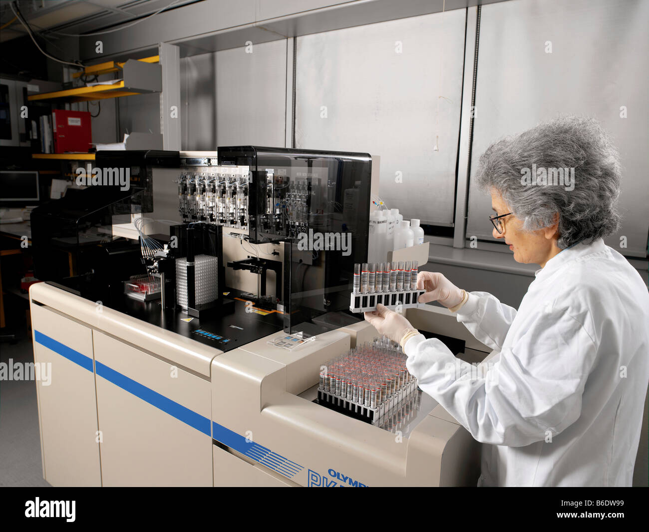 Blood typing. Researcher preparing samples of donated blood for ...