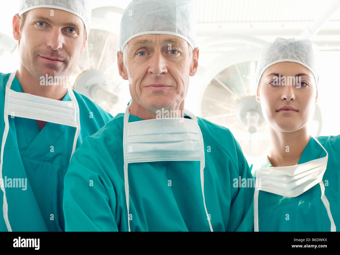 Surgical team in an operating theatre Stock Photo - Alamy