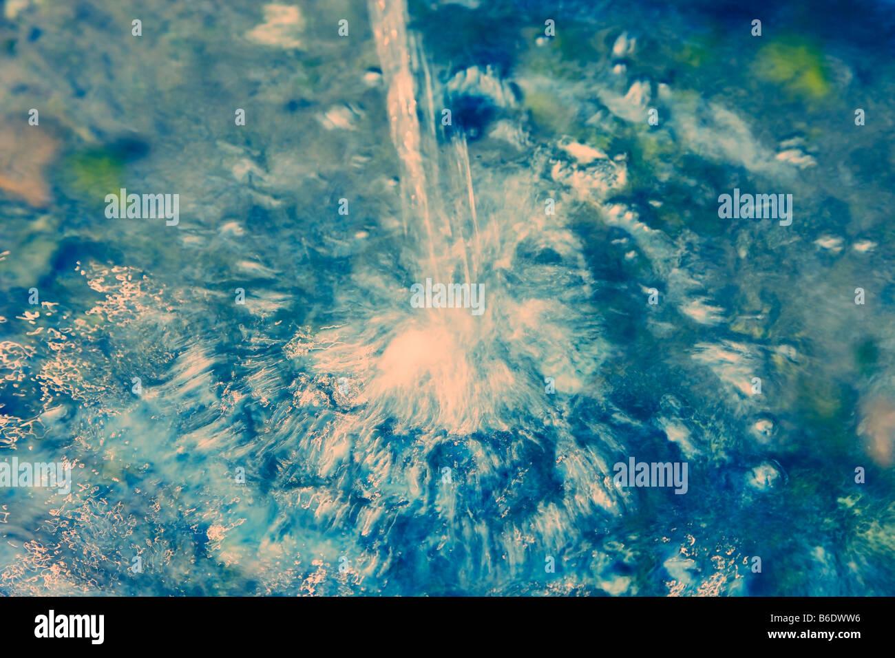 Water splashing into a pool Stock Photo - Alamy