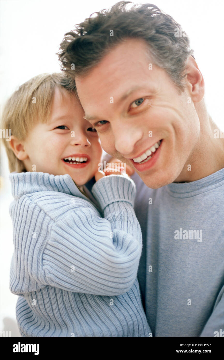 Fatherhood. Loving father holding his three year old son Stock Photo ...