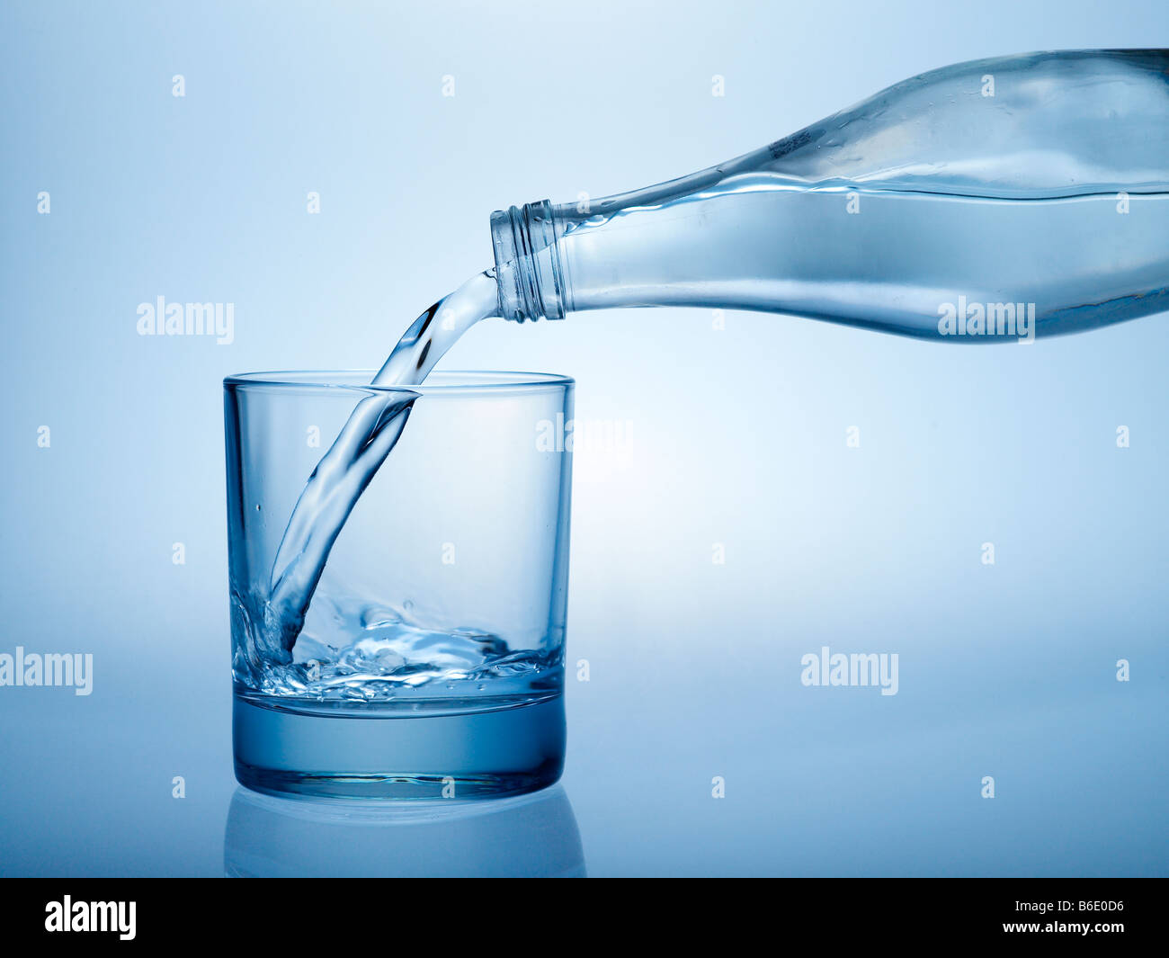 Bottle Pouring Water Stock Photo - Alamy