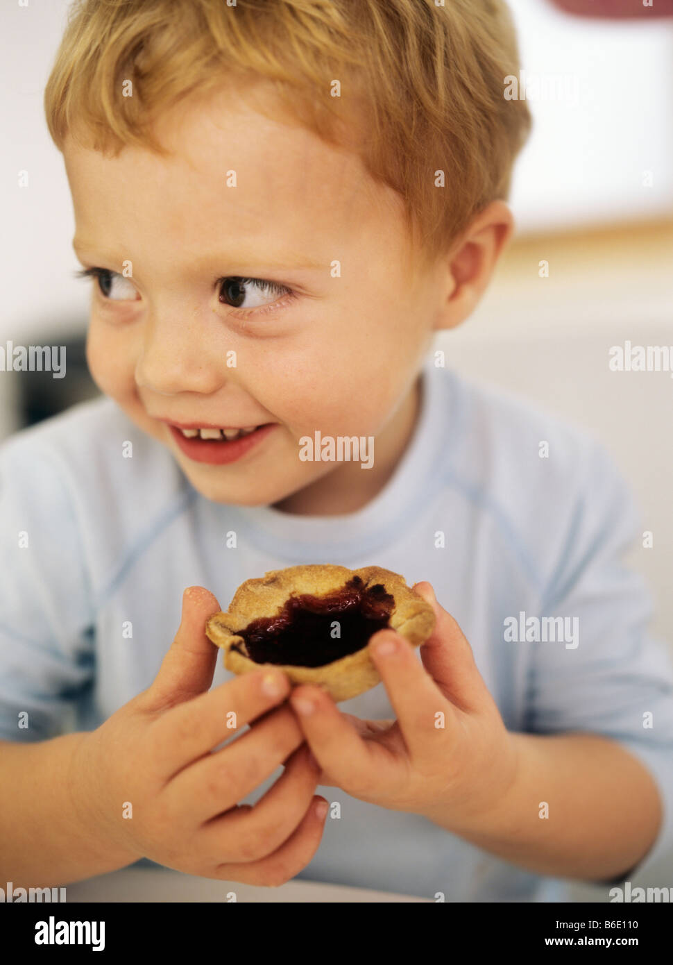 Cake treat child nutrition caucasian ethnicity hold hi-res stock ...