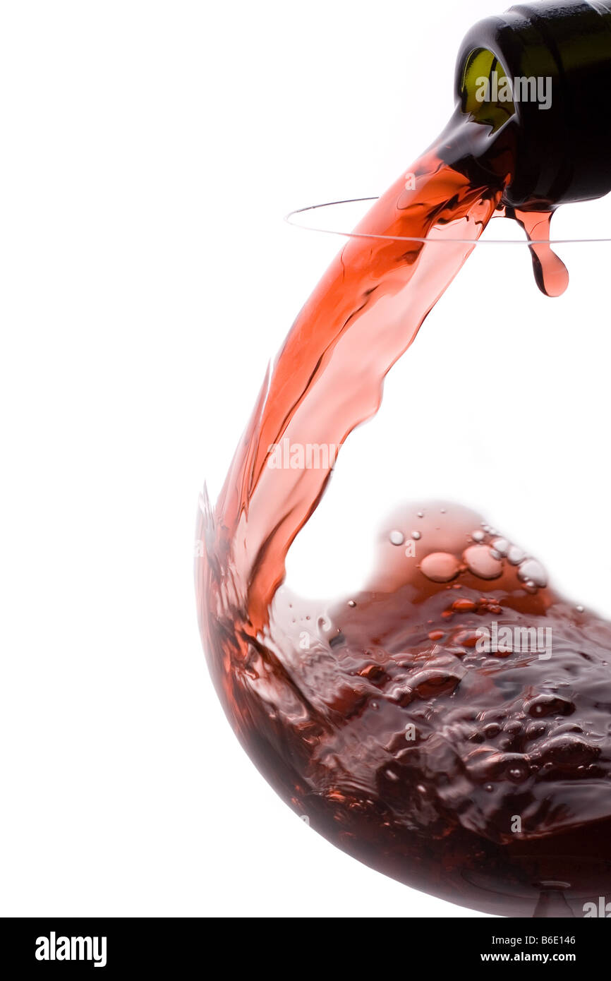 red wine flow in a transparent glass Stock Photo - Alamy