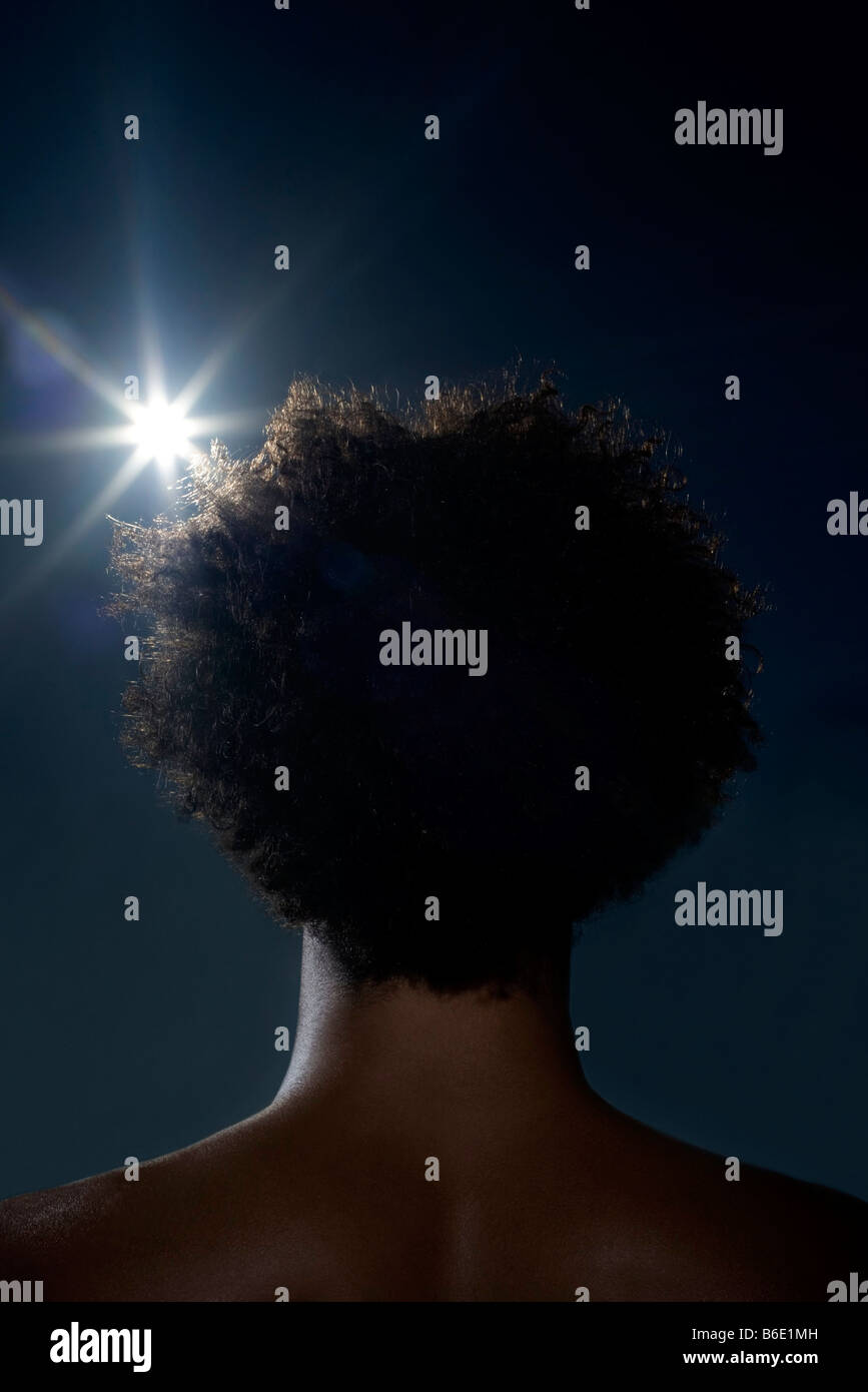 Sun exposure. Man standing facing the sun Stock Photo - Alamy