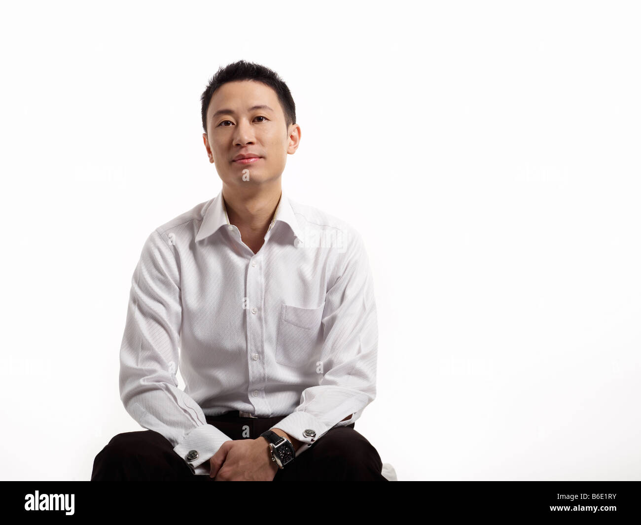 Man sitting down Stock Photo - Alamy