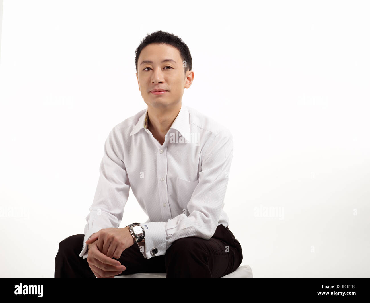 Man sitting down Stock Photo - Alamy