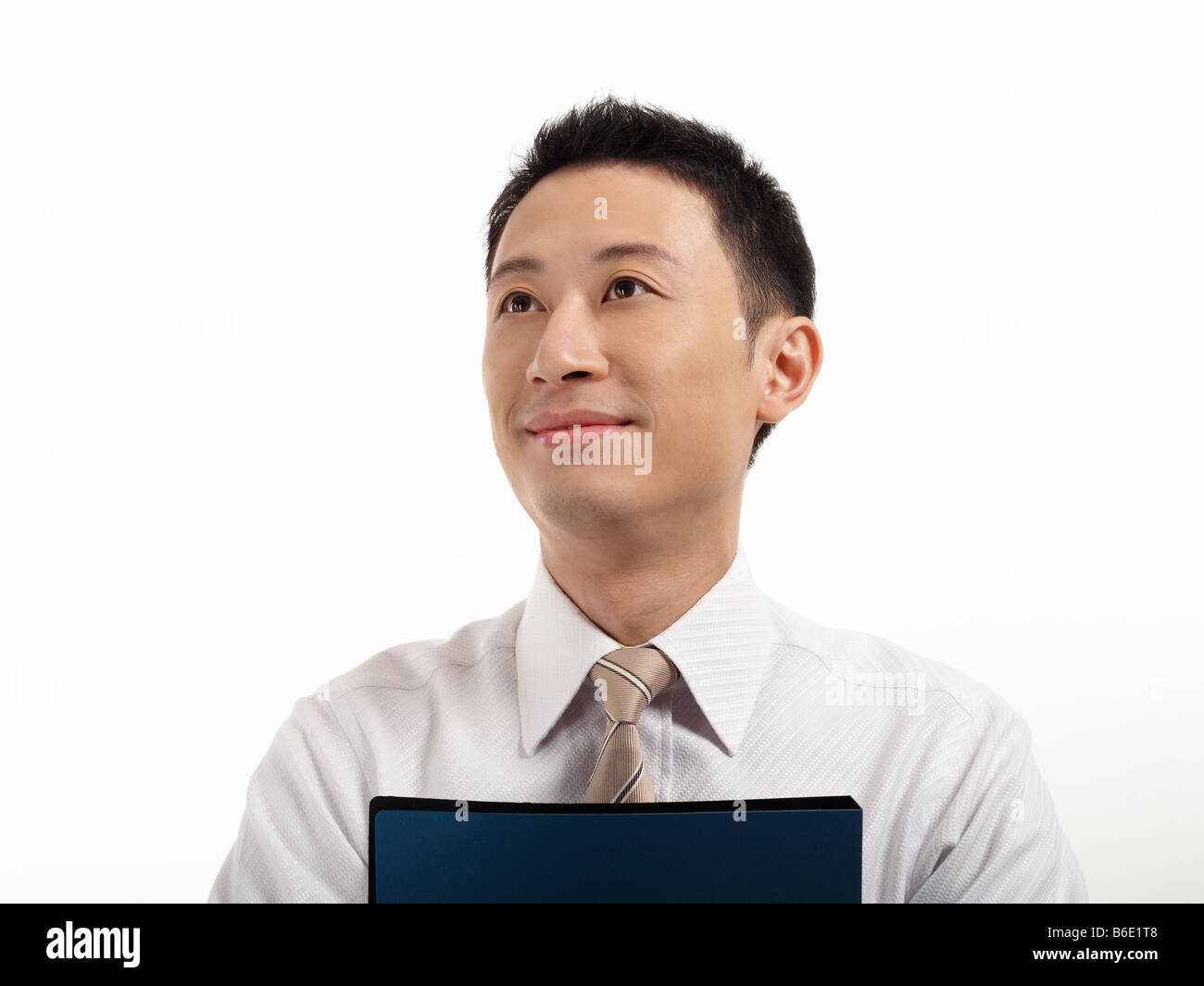 Businessman holding file Stock Photo - Alamy Businessman holding file Stock Photo - Alamy