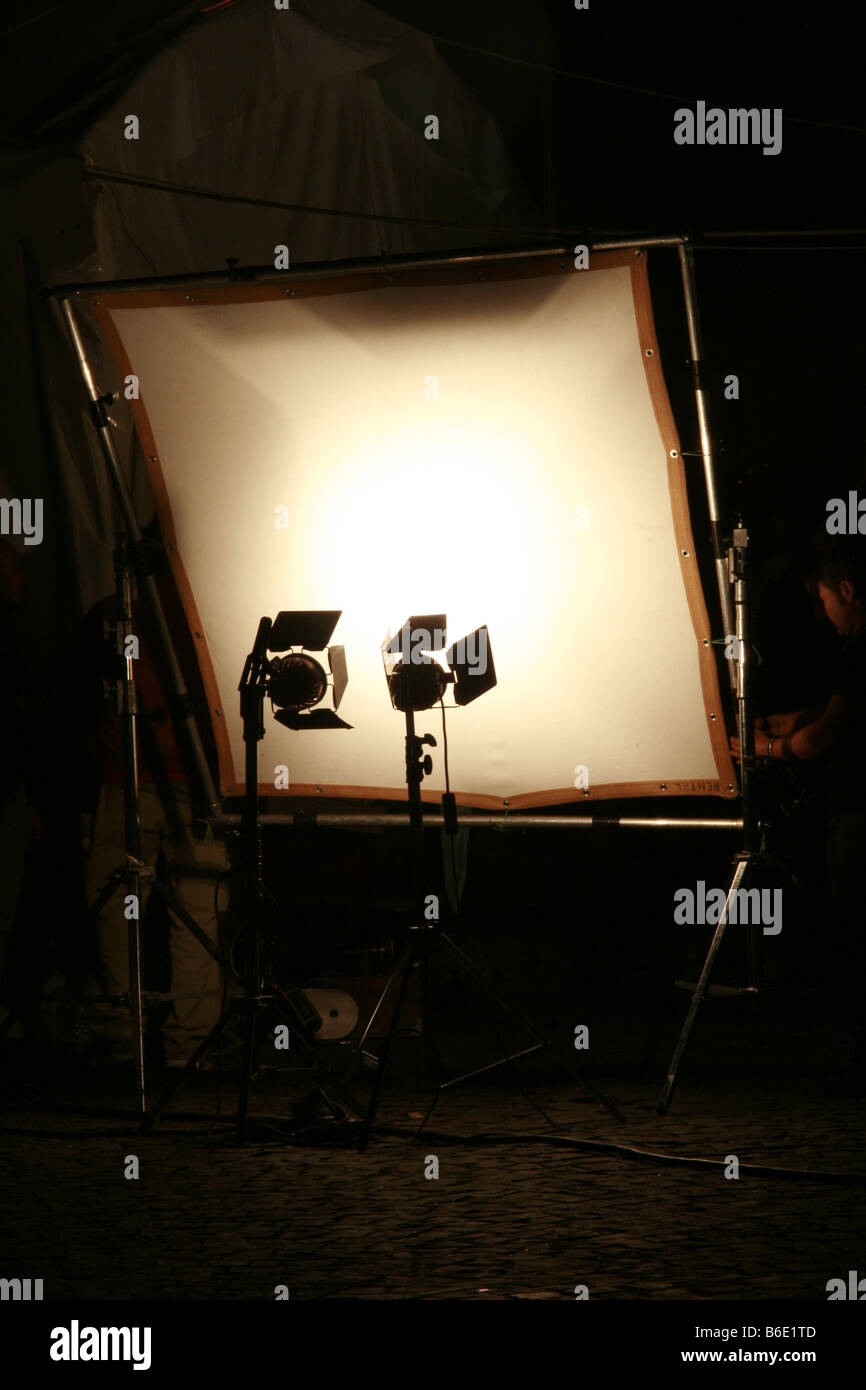 two tv film lights on set outdoors at night Stock Photo - Alamy