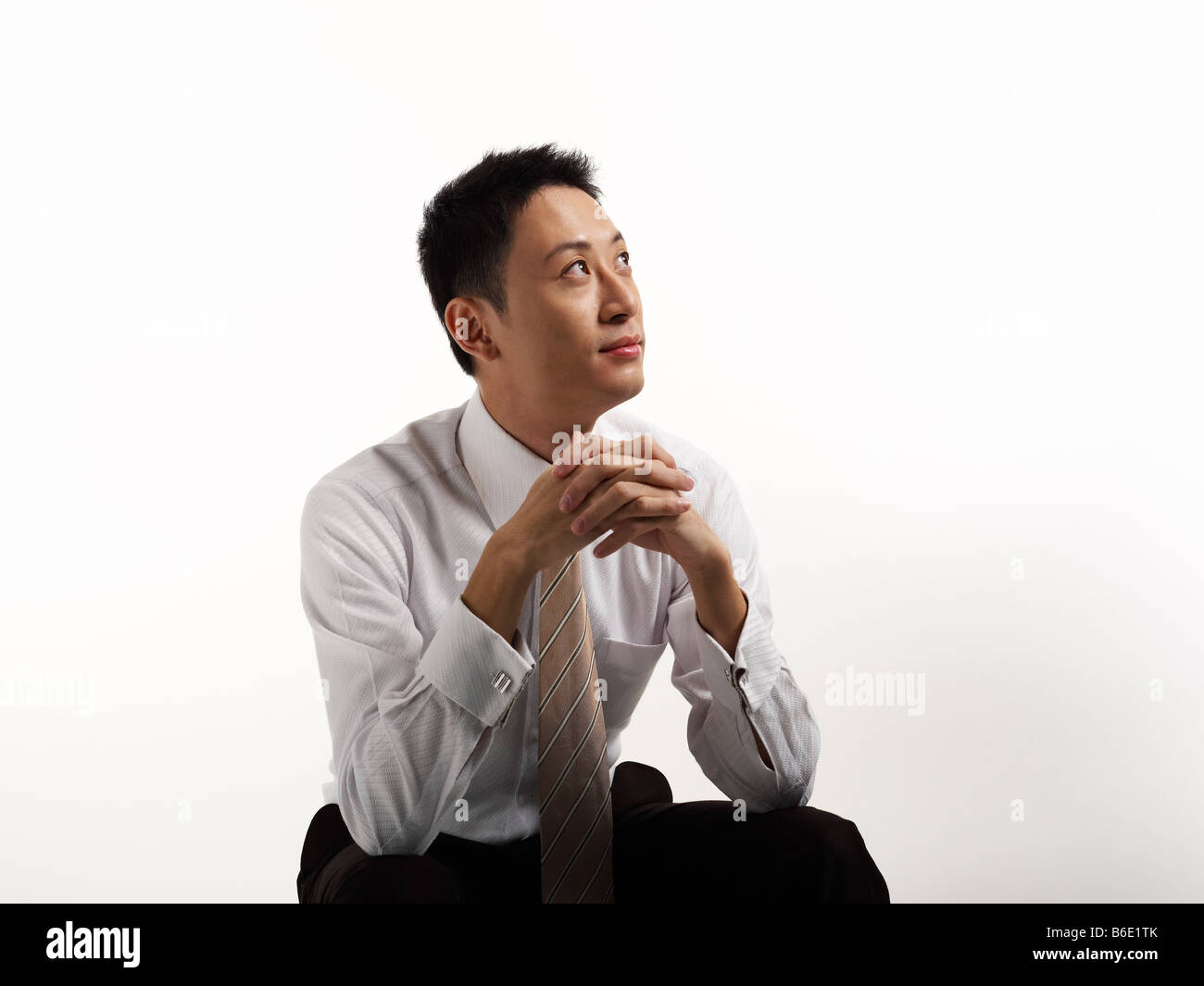 Man sitting down Stock Photo - Alamy