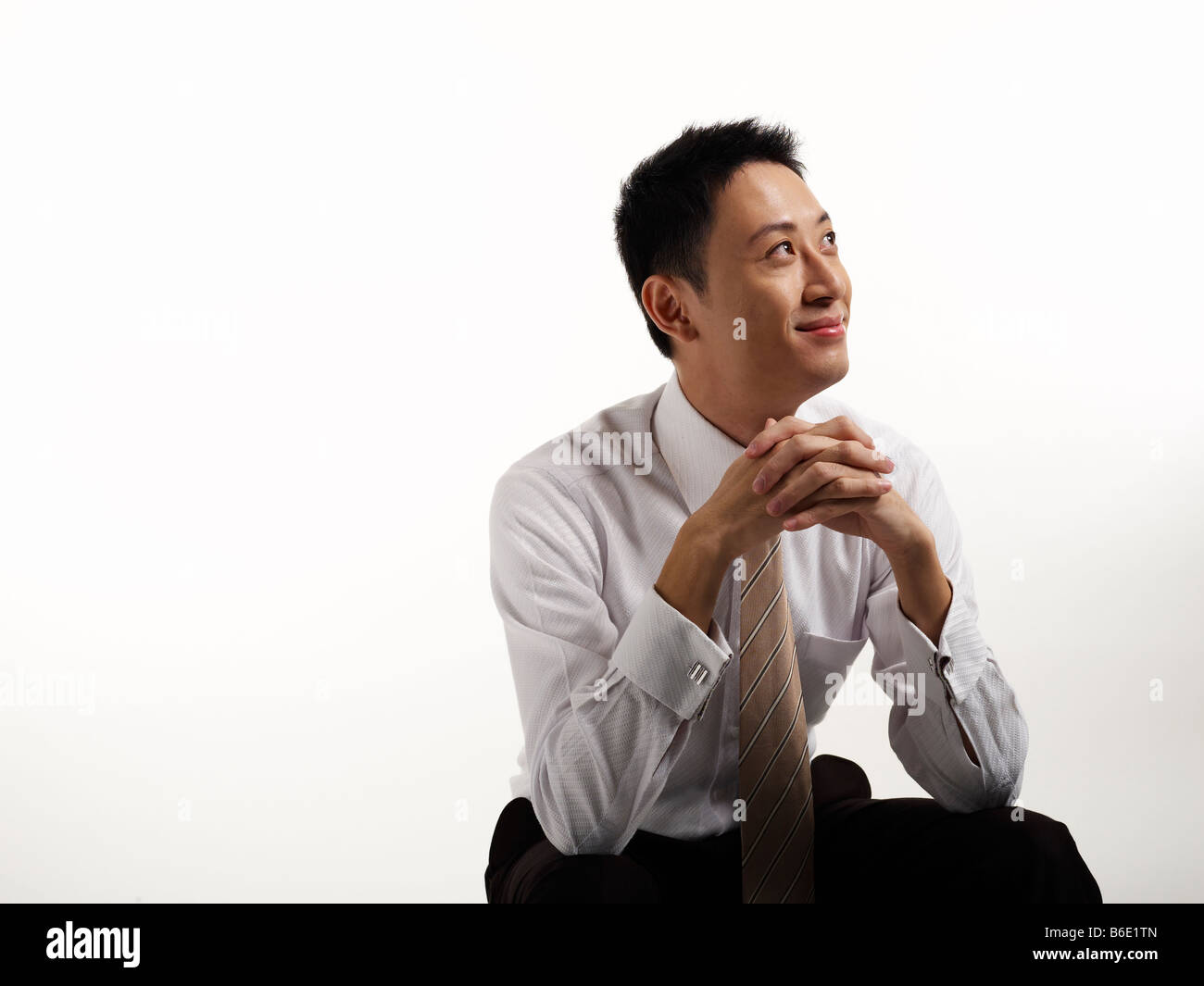 Man sitting down Stock Photo - Alamy