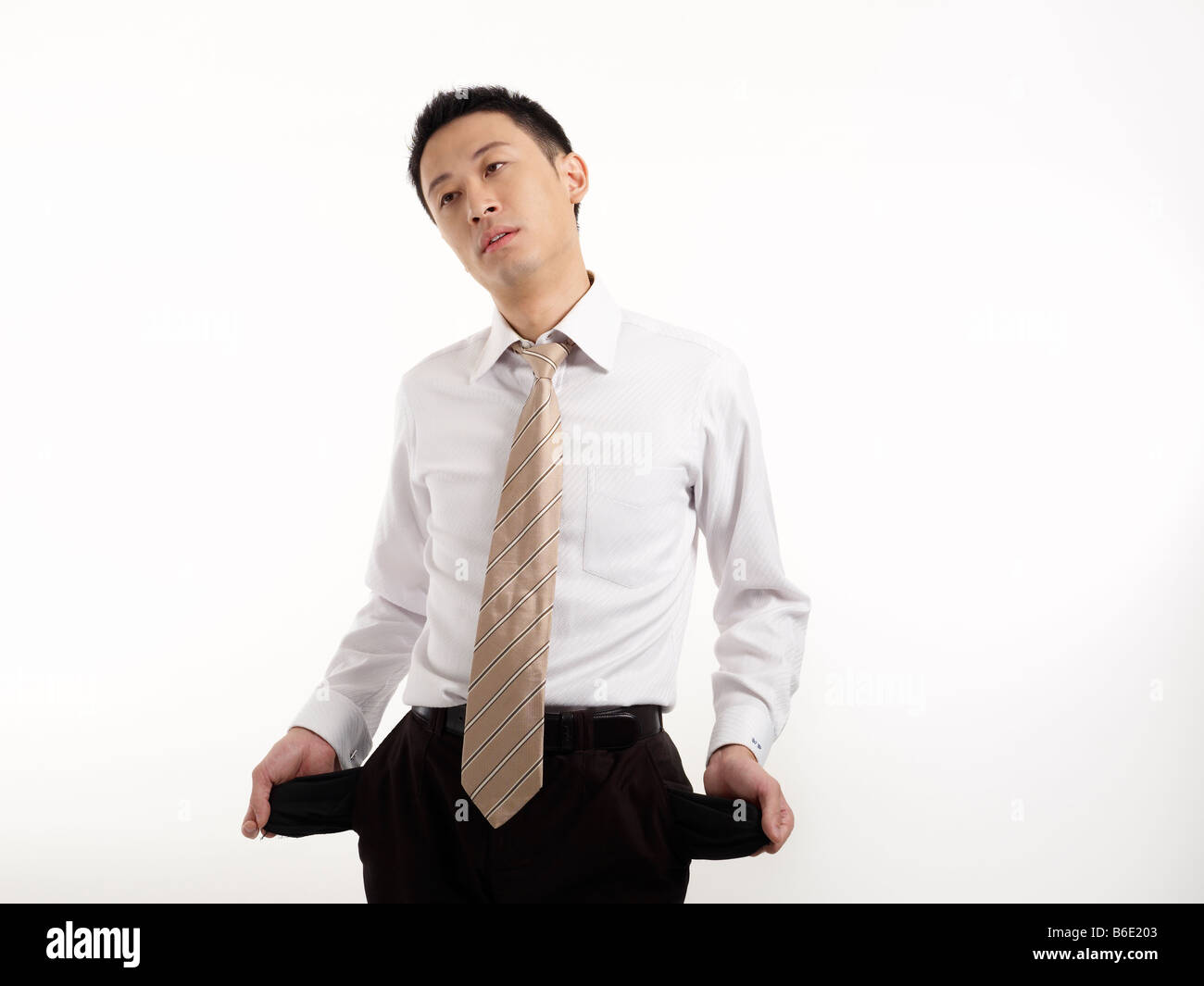 Businessman pulling out empty pockets hi-res stock photography and ...