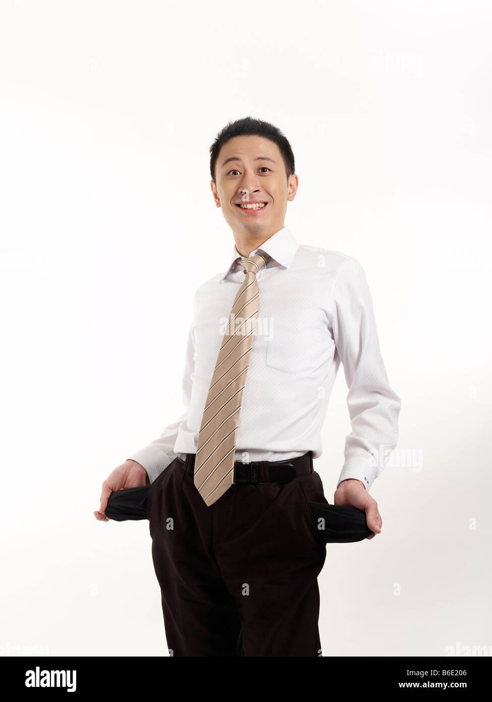 Businessman pulling out empty pockets hi-res stock photography and ...