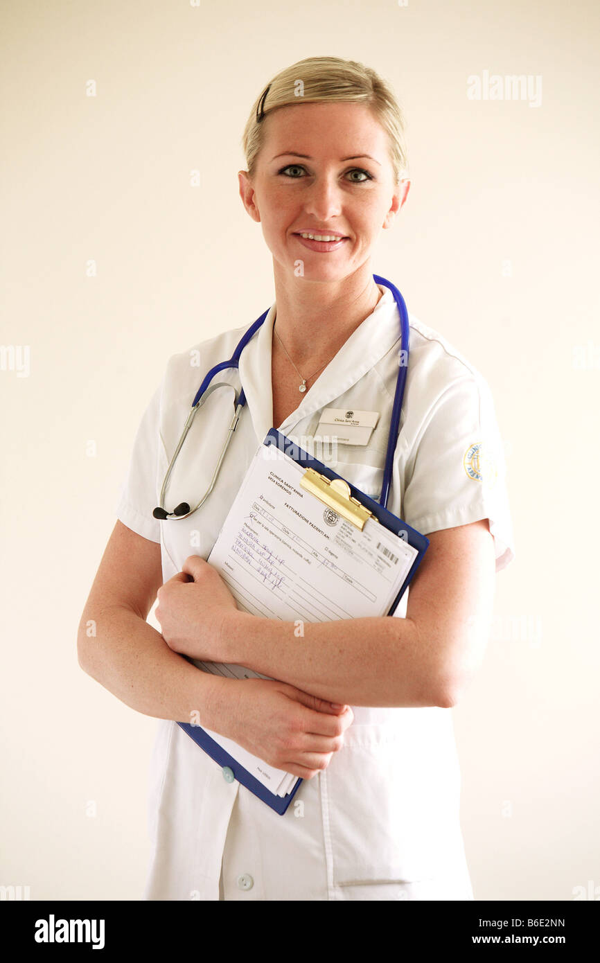 Nurse holding medical records Stock Photo - Alamy