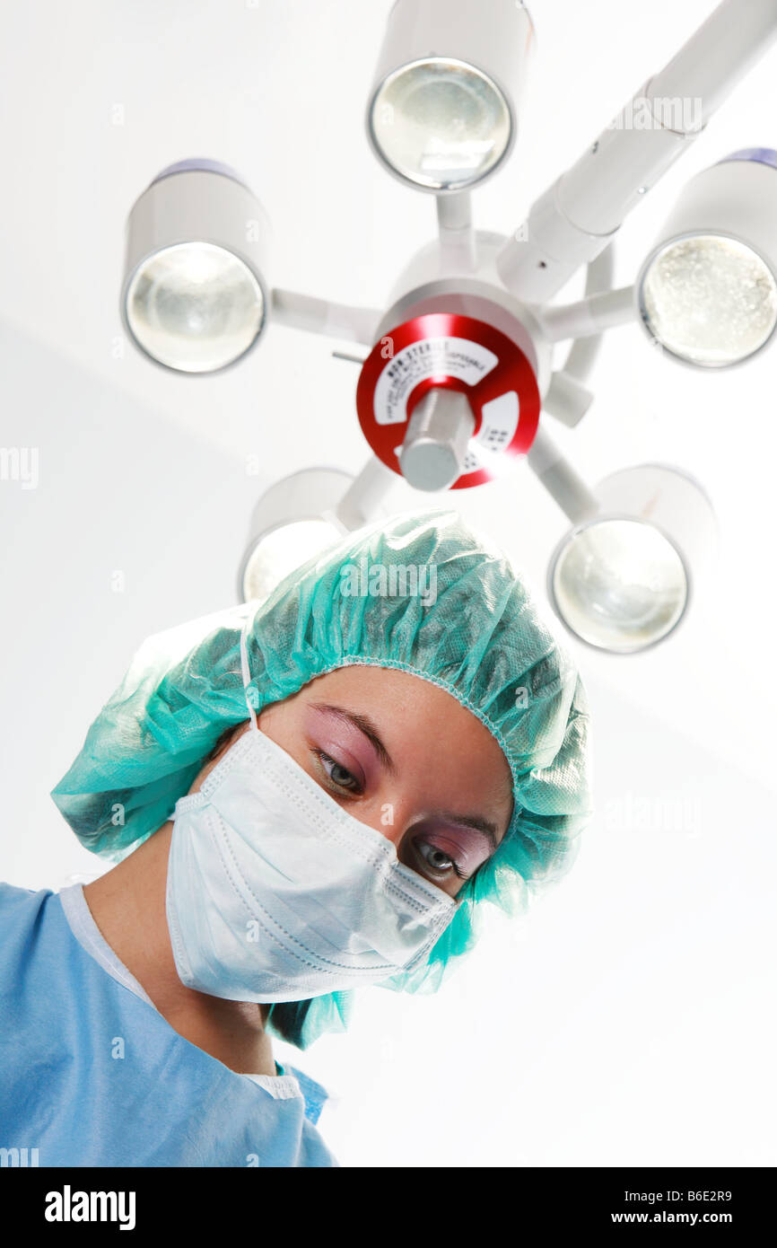 Surgeon performing an operation Stock Photo - Alamy