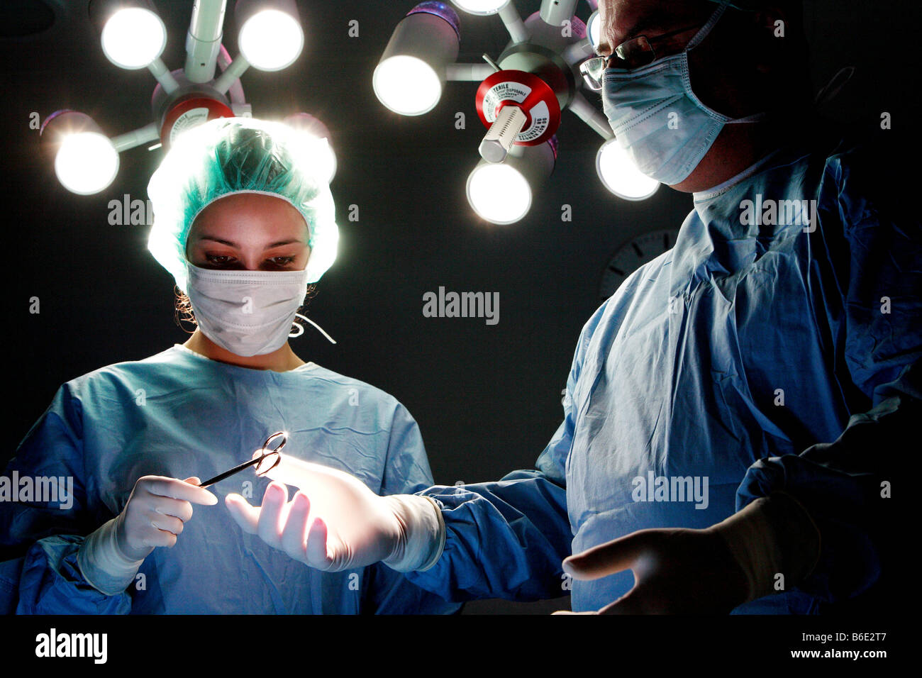 Surgeons performing an operation Stock Photo - Alamy