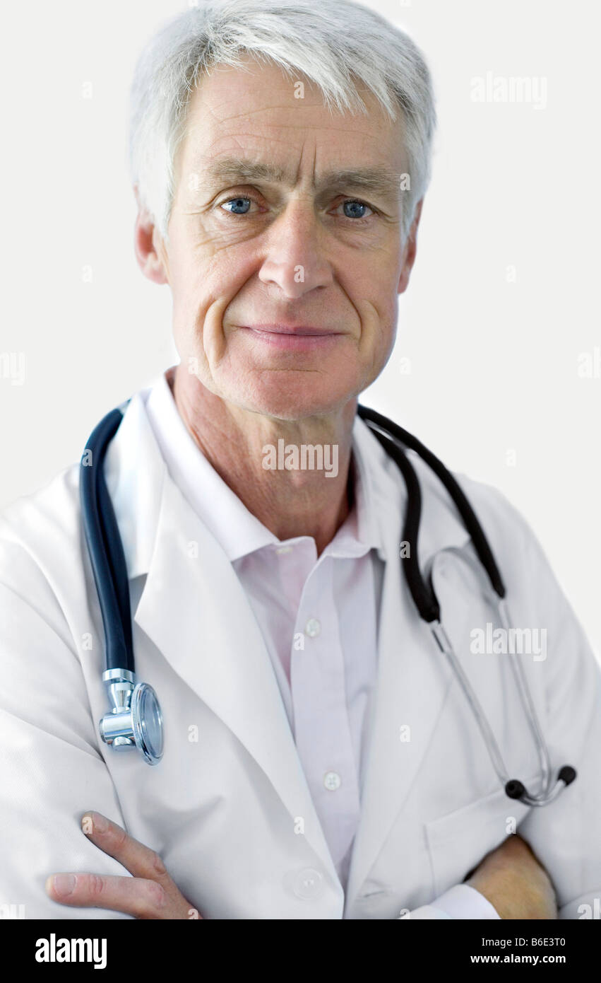 Senior doctor smiling, portrait Stock Photo - Alamy