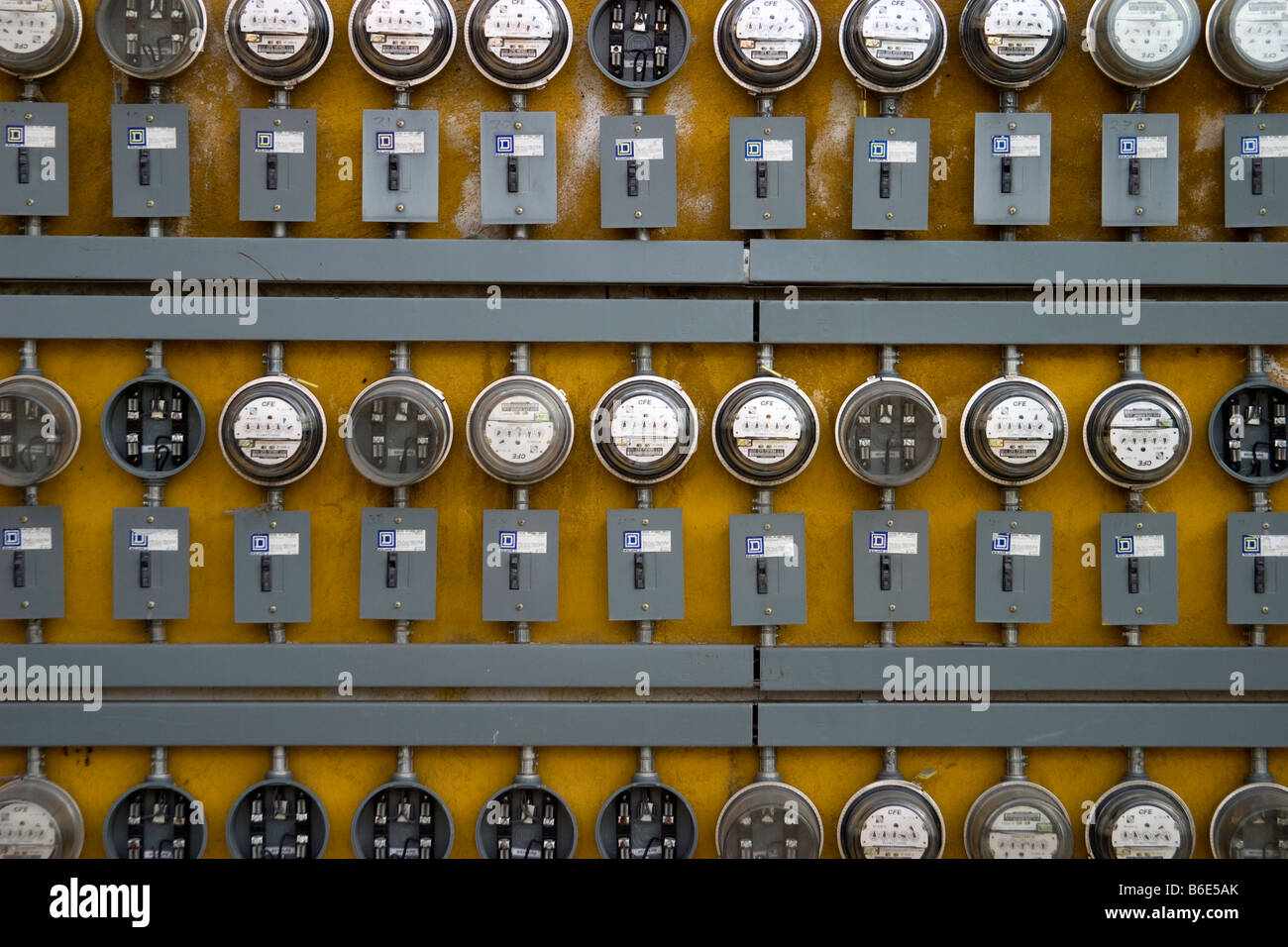 Electric meters on wall in San Miguel de Allende Mexico Stock Photo - Alamy