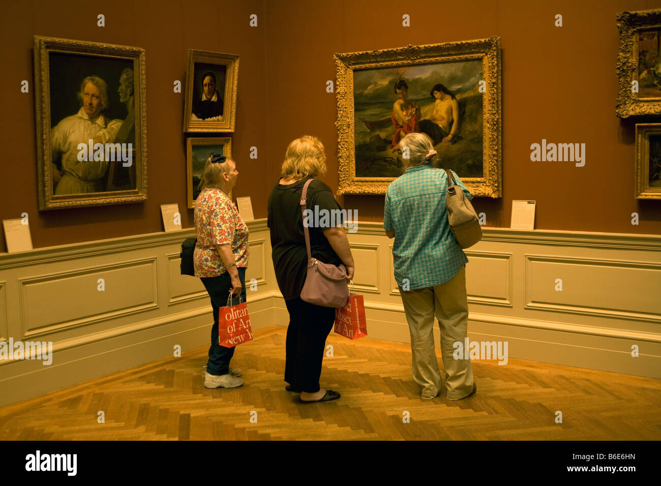Museum goers view master works at the Metropolitan Museum of Art in New ...