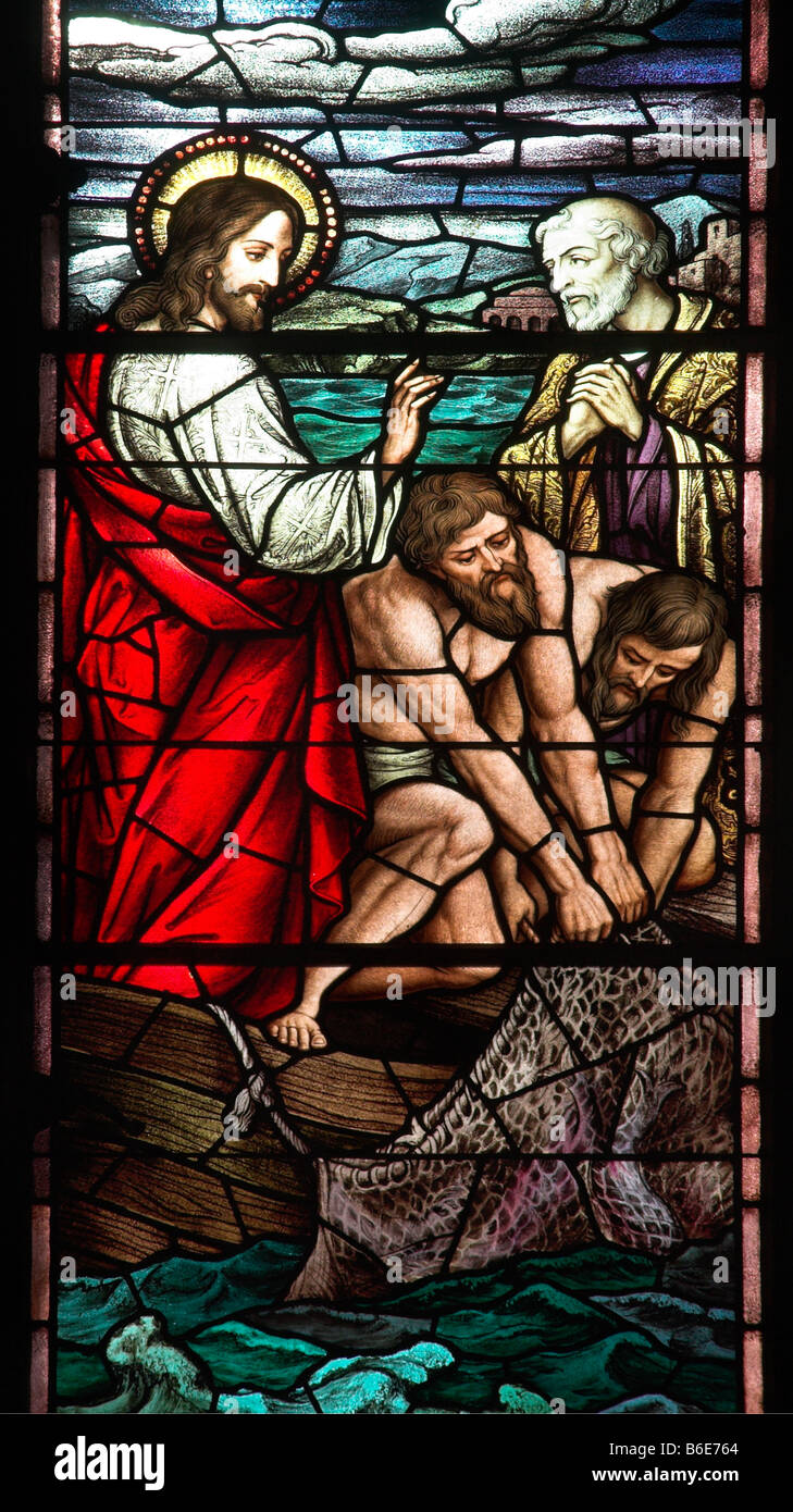 A stained glass window of jesus blessing fishermen on a boat Stock ...