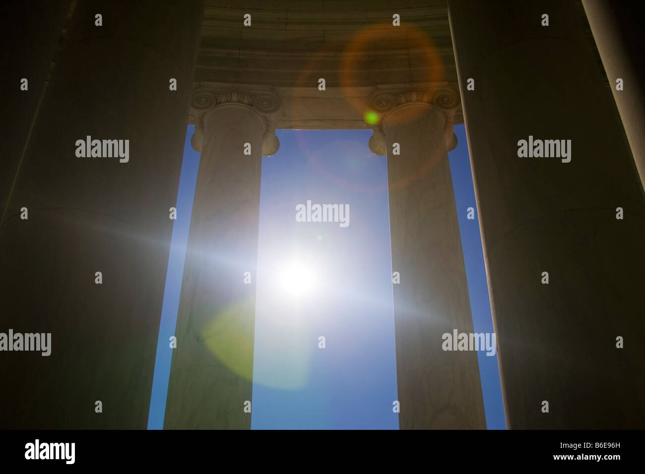 Sunlight through marble columns Stock Photo - Alamy