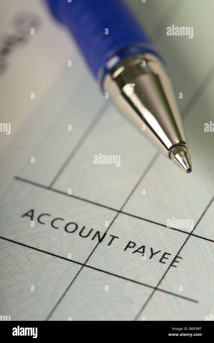 Cheque book and pen money for Account Payee Stock Photo - Alamy
