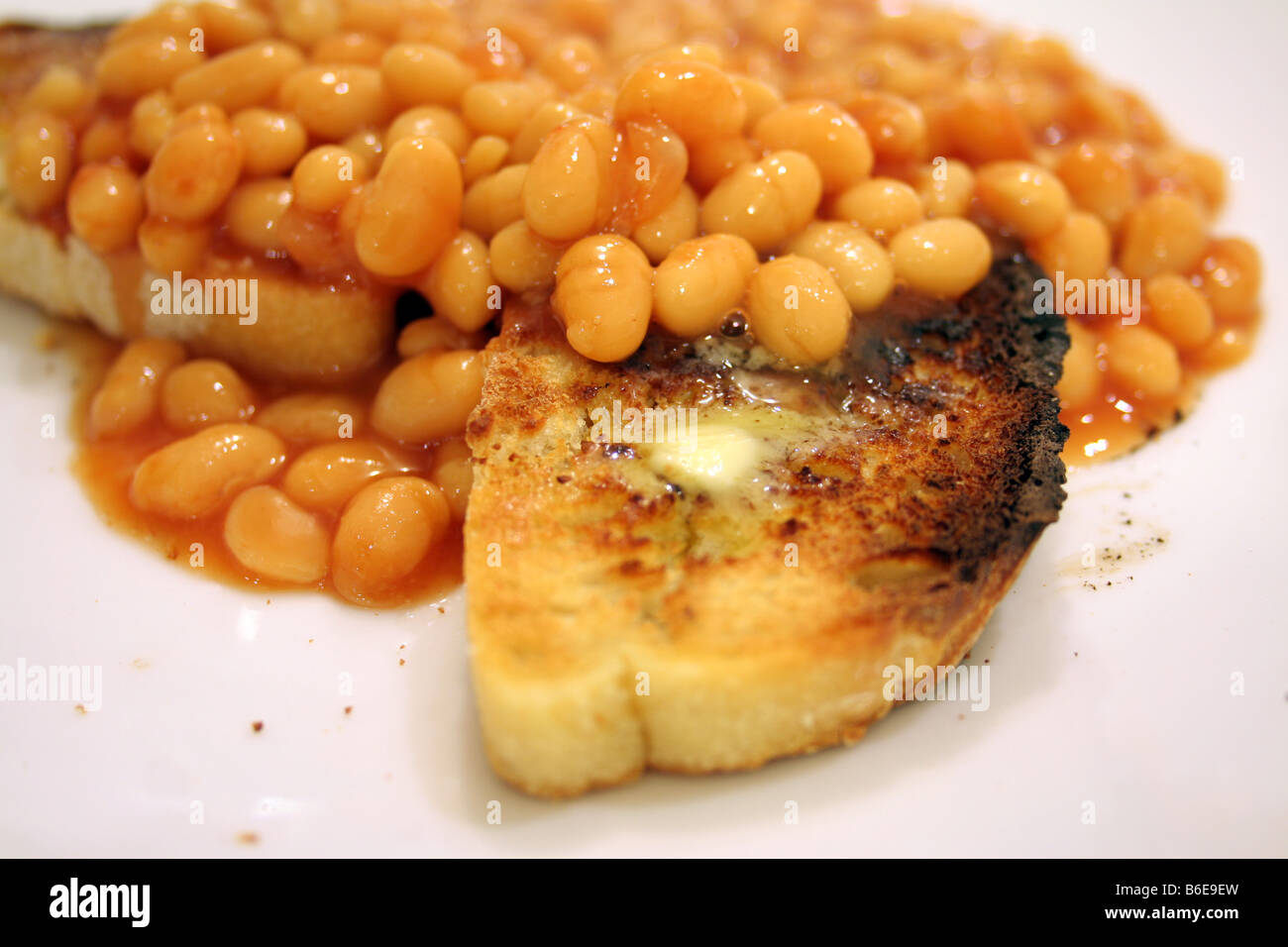 Baked beans on toast, a popular British dish Stock Photo - Alamy