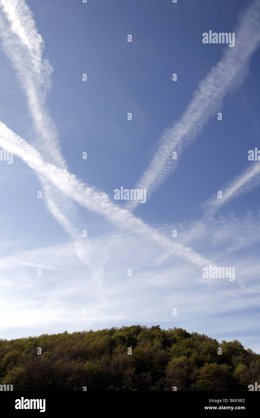 unusual crossing cloud formation in countryside Stock Photo - Alamy