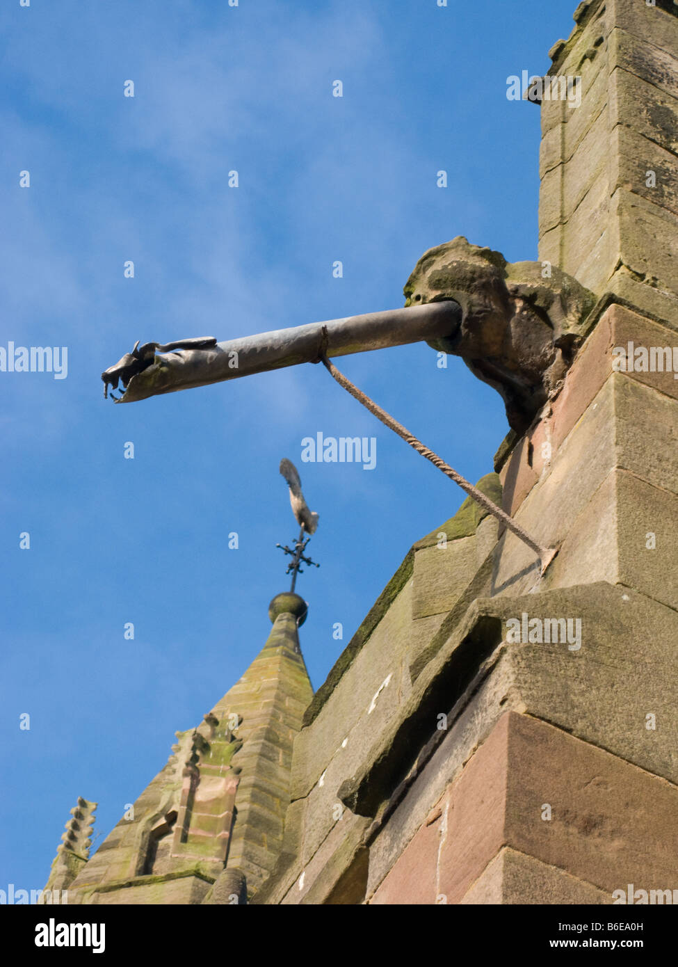 Gargoyle with pipe as spout. Tong church (St Bartholomew's), Shropshire ...