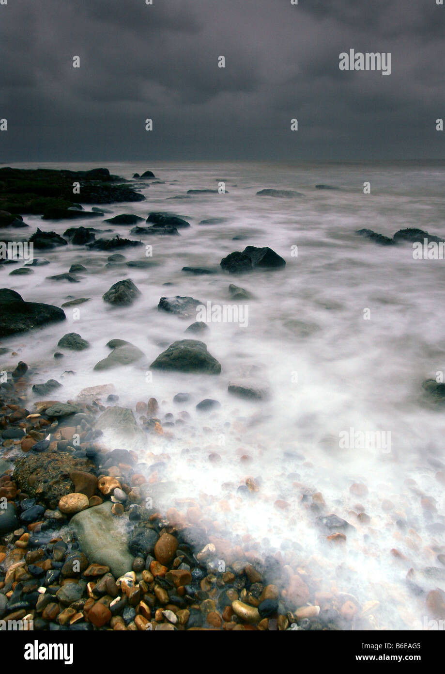 Rocks battered waves hi-res stock photography and images - Alamy