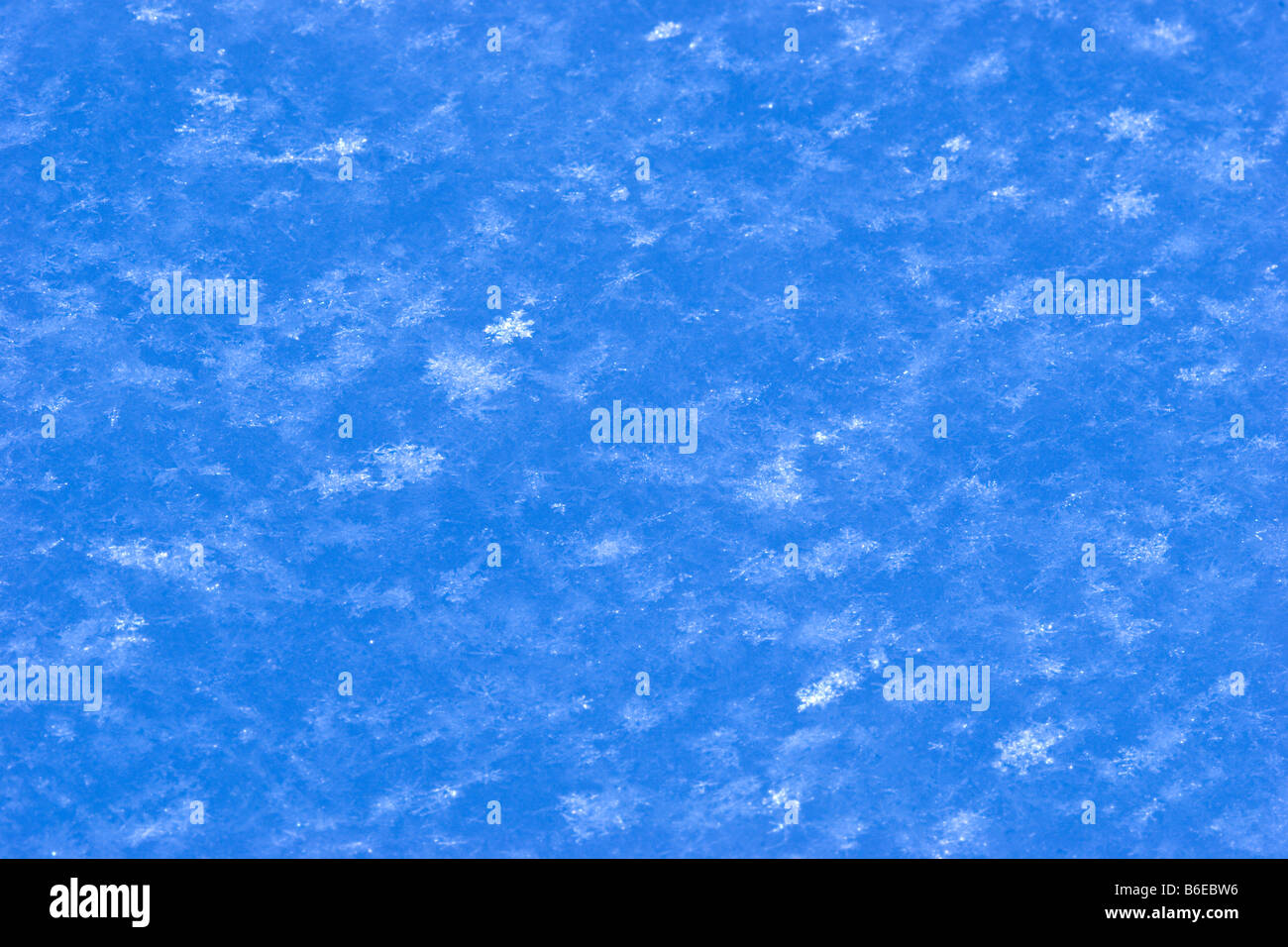Snowflake blue background hi-res stock photography and images - Alamy