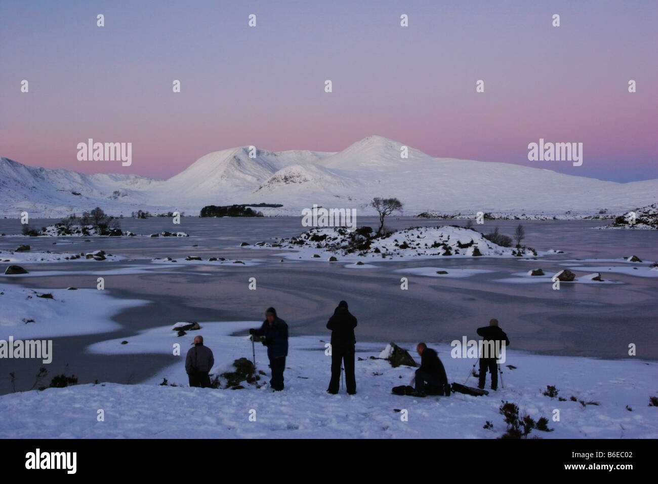 A group of photographers waiting for sunrise at Black Mount Stock Photo ...