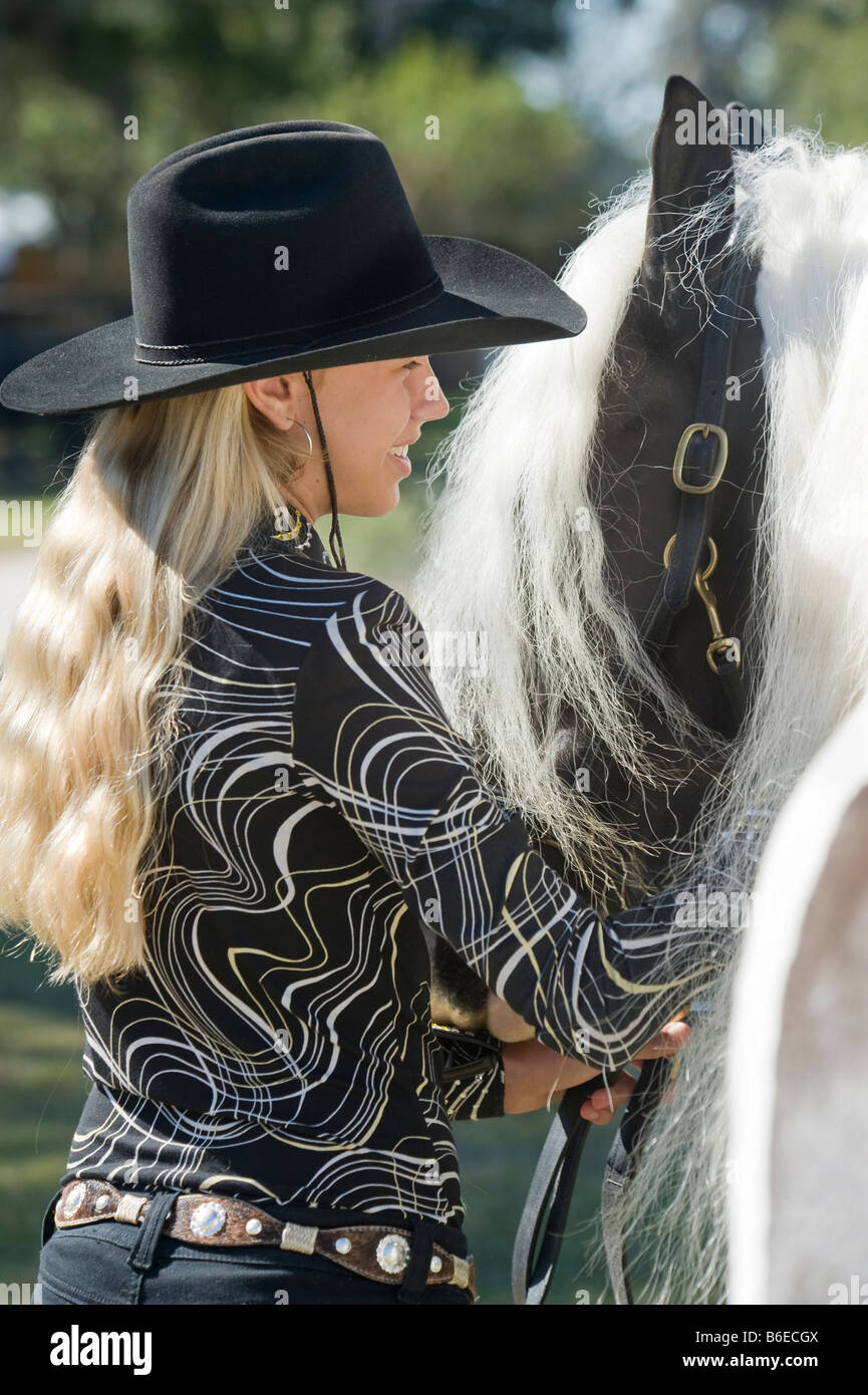 Teen girl wearing western attire with Gypsy Vanner Horse mare Stock ...