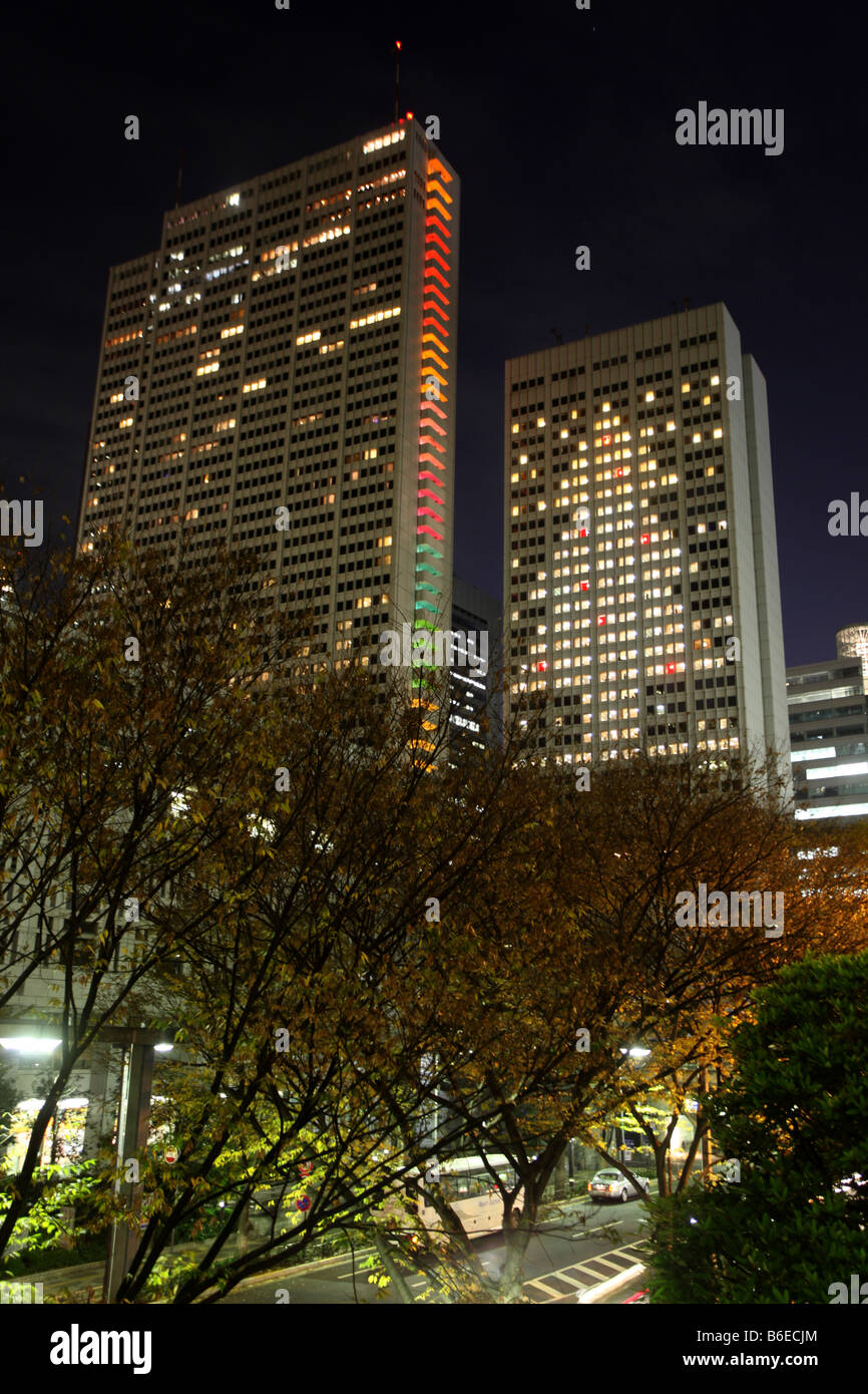 The lights in the rooms of a skyscraper create an image of a musical ...