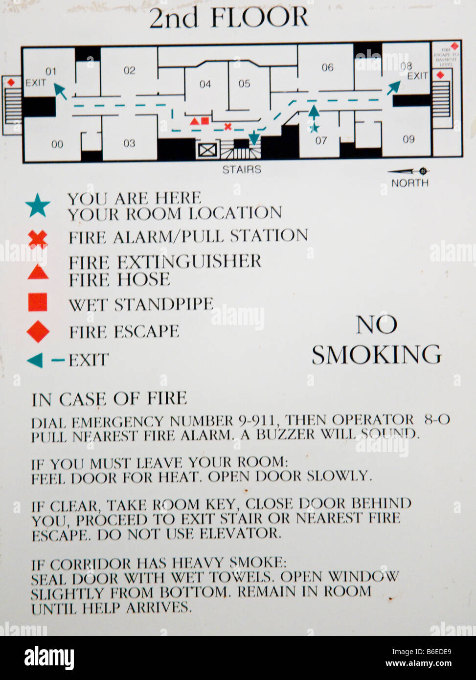 Hotel fire escape instruction Stock Photo - Alamy