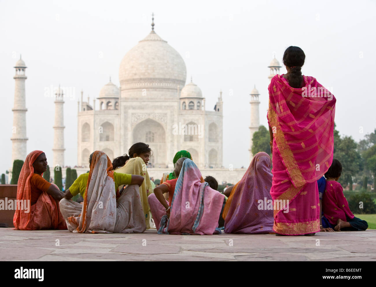 Indian ladies in colorful clothing at the Taj Mahal in Agra, India ...