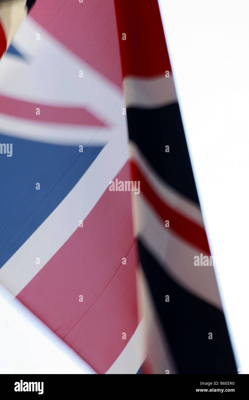 abstract union jack flag flying in wind in sun Stock Photo - Alamy