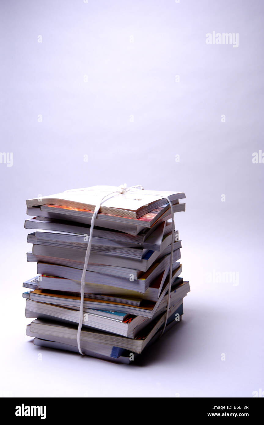 Books tied up in a stack Stock Photo - Alamy