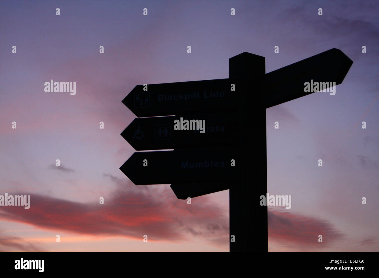 A Waymarker or Signpost in Silhouette Against a Sunset Sky Stock Photo ...