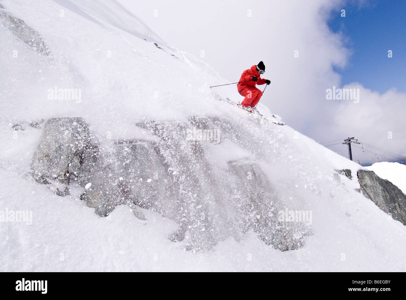 Skier dropping a cliff on Blackcomb Mountain Stock Photo - Alamy