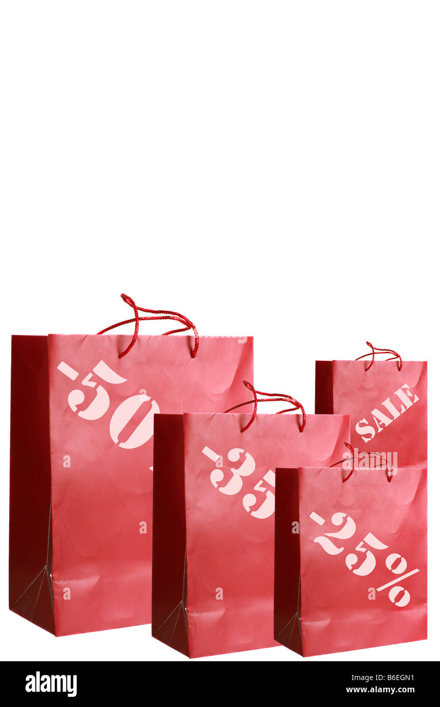 Four red paper bags for sale and special offer prizes over white ...