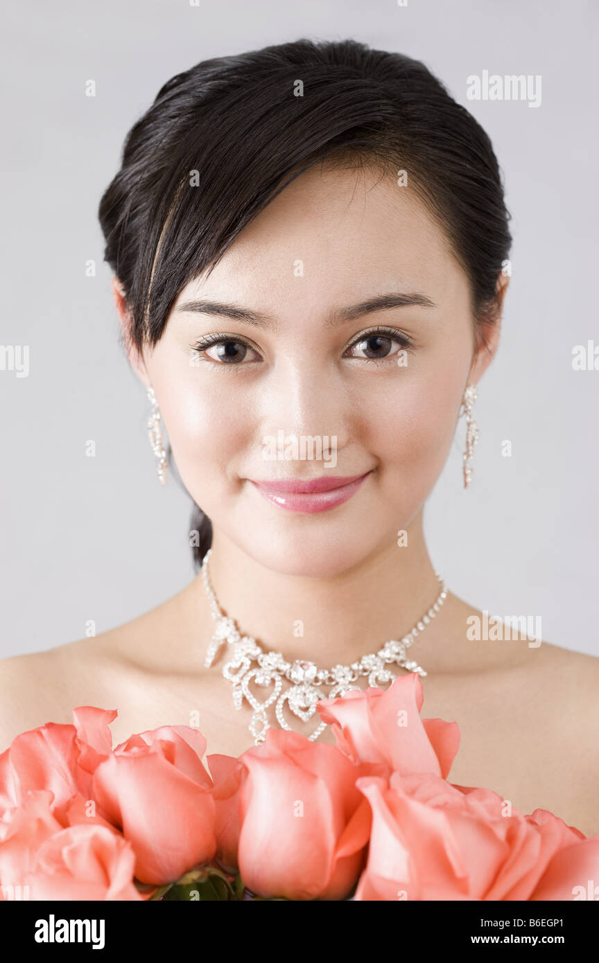 Beautiful asian woman pink rose hi-res stock photography and images - Alamy